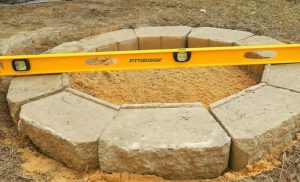 How to Build a Safe and Durable Fire Pit with Retaining Wall Blocks
